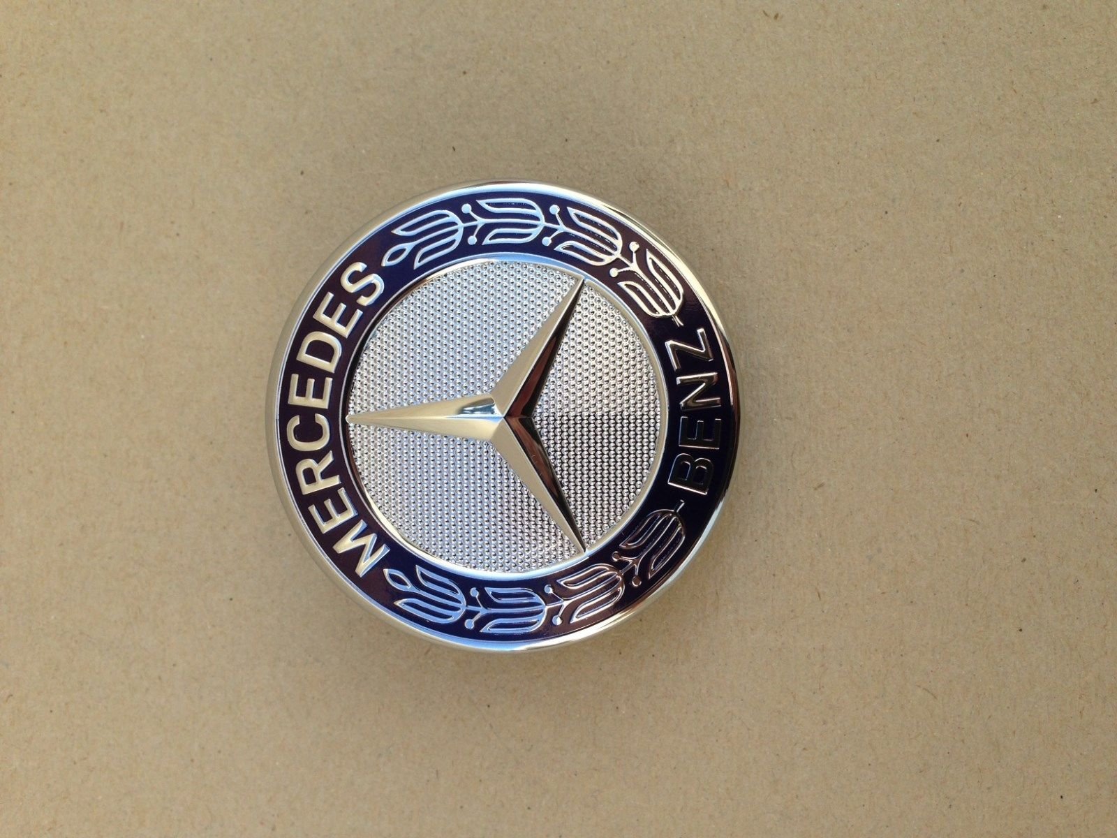 Genuine Mercedes 212-817-03-16 Mercedes Hood Badge | Autoplicity